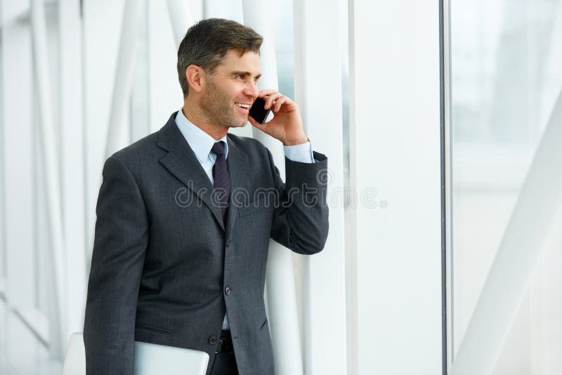 Smiling Business Man Talking on Mobile Phone Stock Photo - Image of ...