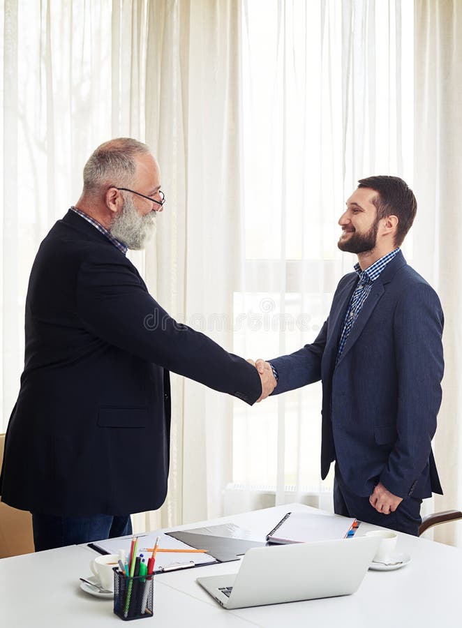 Smiling Business Partners Handshaking Stock Photo - Image of education ...