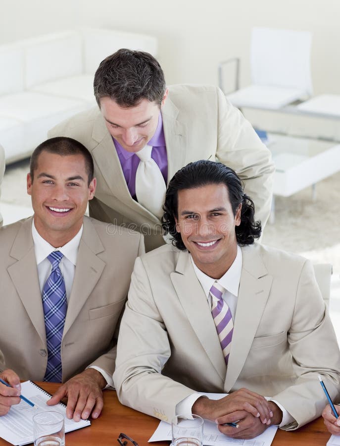 Smiling Business Partners Working Together Stock Image - Image of multi ...