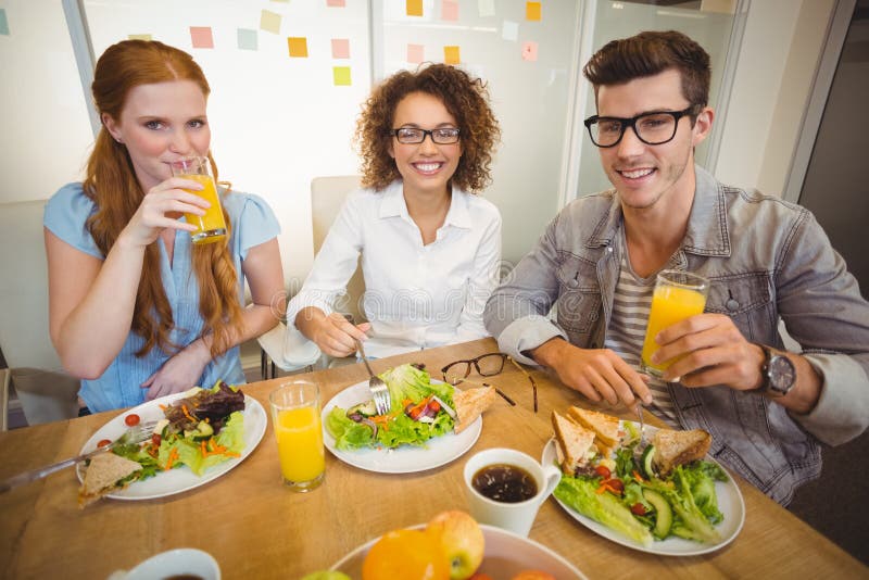 Smiling Business People Having Breakfast Stock Image - Image of ...