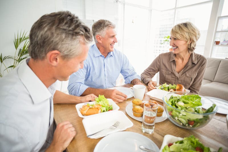 Smiling Business People Having Lunch Together Stock Photo - Image of ...
