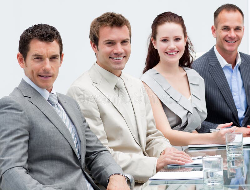 Smiling Business People at a Presentation Stock Image - Image of ...