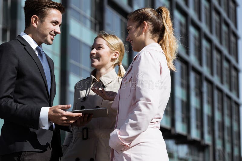 Smiling business people stock image. Image of outdoor - 63882887