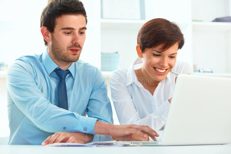 Smiling Business People Working Together in the Office Stock Image ...