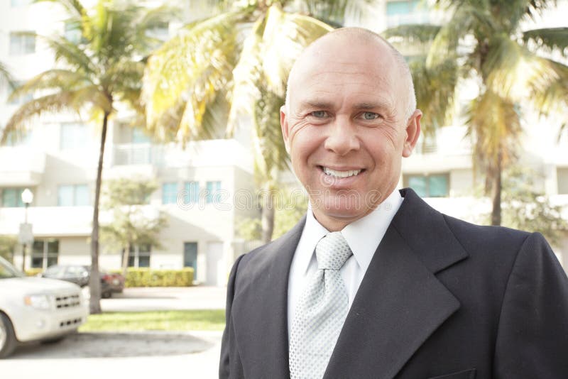 Smiling businessman stock image. Image of single, tropical - 11504321
