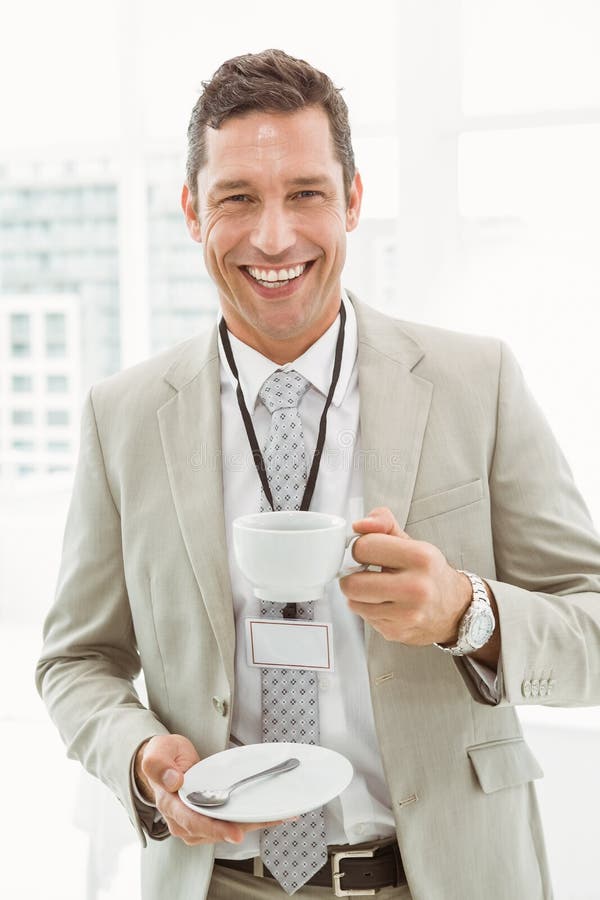 Smiling Businessman during Break Time in Office Stock Photo - Image of ...