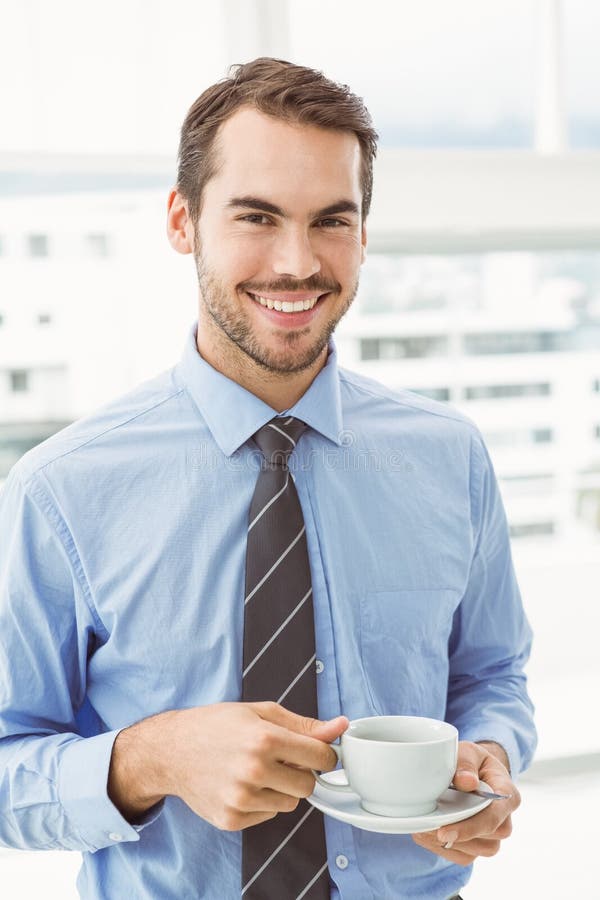 Smiling Businessman during Break Time in Office Stock Photo - Image of ...