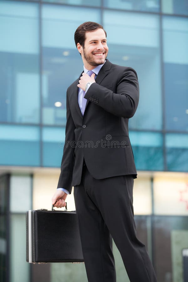 Smiling Businessman in Front of an Office Building Stock Photo - Image ...