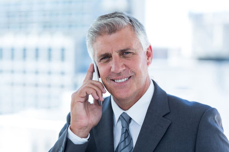 Smiling Businessman Having a Phone Call Stock Photo - Image of relaxing ...