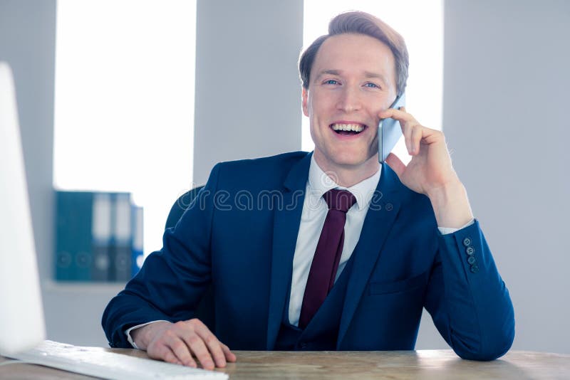 Smiling Businessman Having a Phone Call Stock Photo - Image of sitting ...