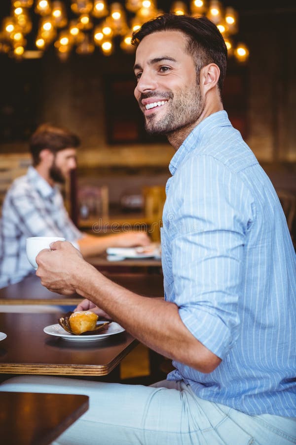 Smiling Businessman Holding a Cup of Coffee Stock Image - Image of cafe ...