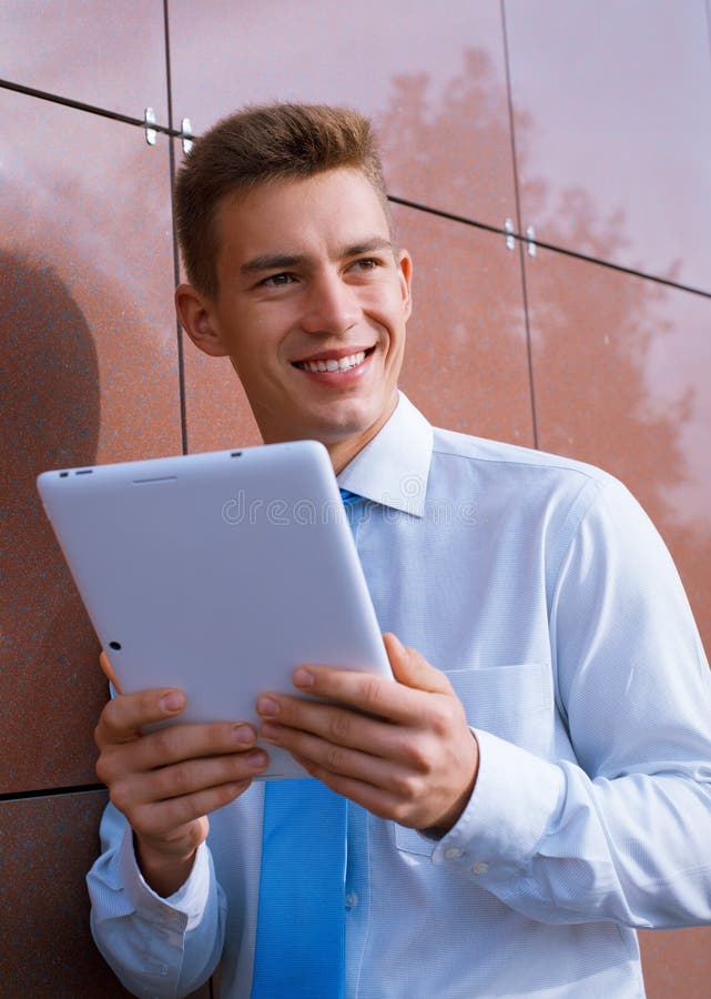 Smiling Businessman Holding Tablet Computer Stock Image - Image of ...