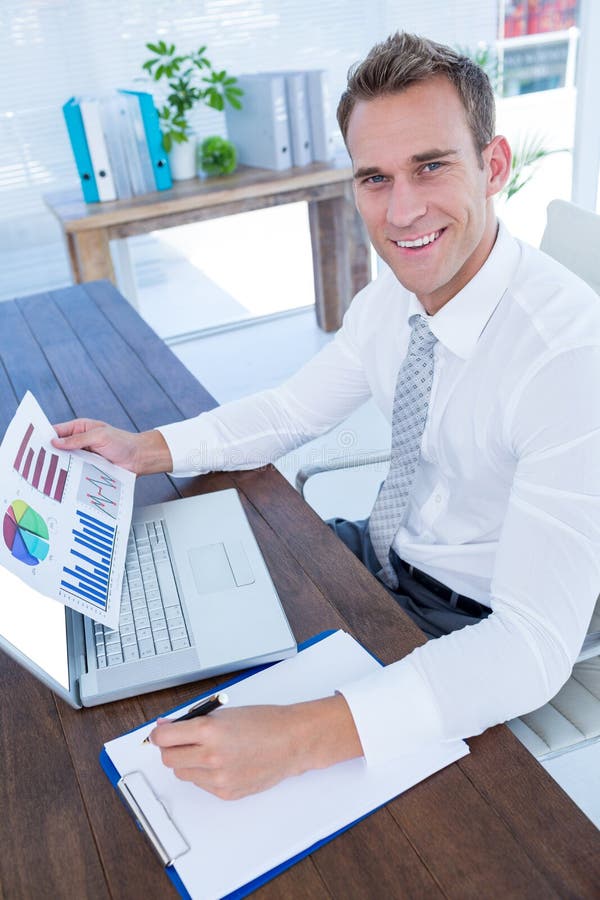 Smiling Businessman Working with Flow Charts Stock Image - Image of ...