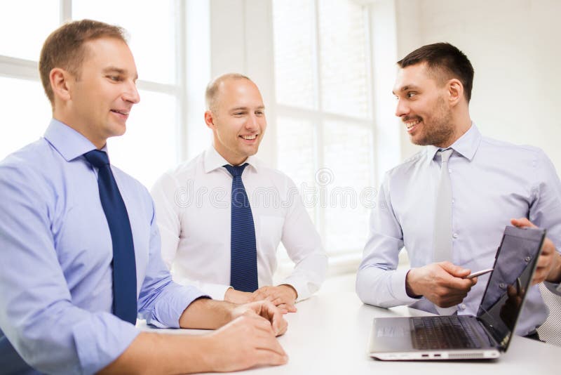 Smiling Businessmen Having Discussion in Office Stock Image - Image of ...
