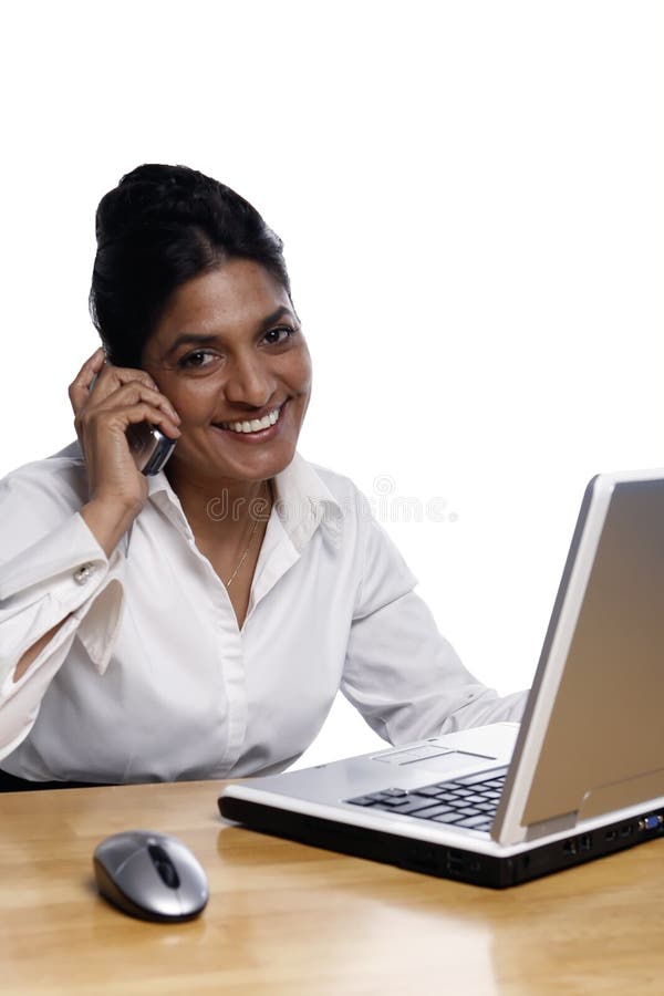 Smiling Businesswoman at Desk Stock Image - Image of smiling, work: 5184177