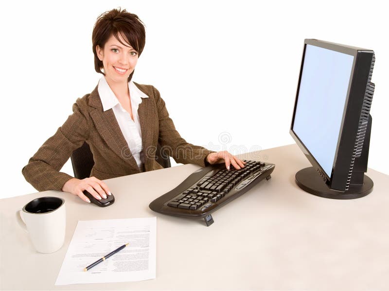 Smiling Businesswoman Working at a Computer Stock Photo - Image of ...