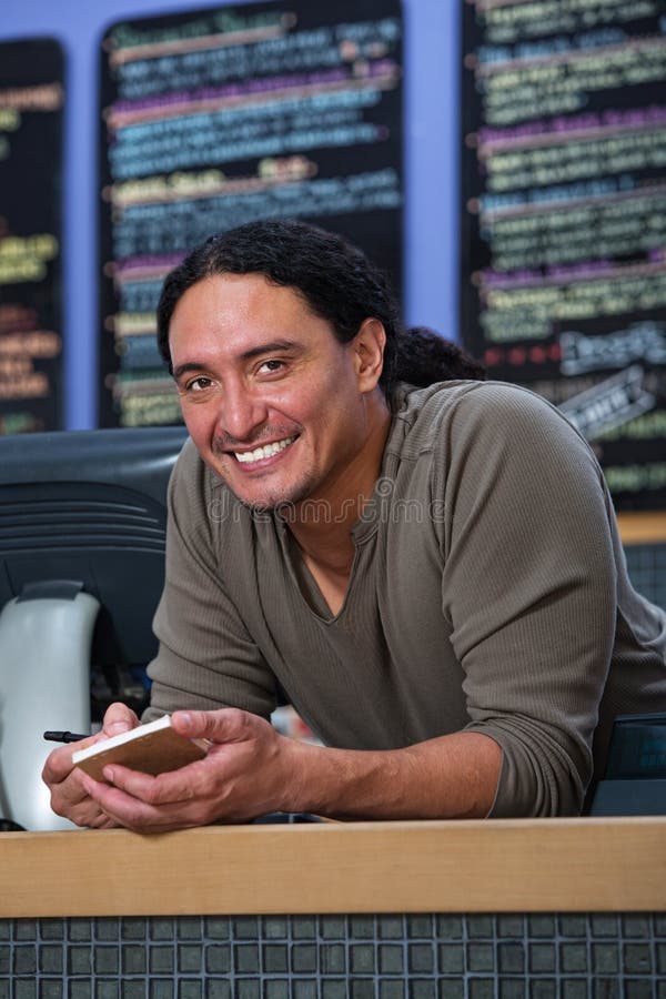 Smiling Cafe Owner stock image. Image of adult, hispanic - 34216613