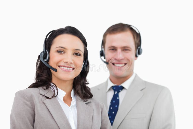 Smiling Call Center Employees Sitting in Line Stock Photo - Image of ...