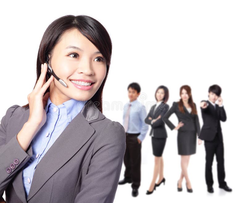 Smiling Call Center Executive with Colleagues Stock Image - Image of ...