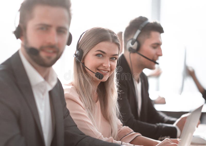 Smiling Call Center Operator Sitting at His Desk Stock Photo - Image of ...