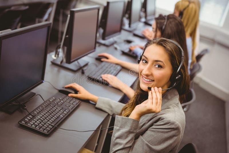Smiling Call Centre Agent Talking on the Headset Stock Image - Image of ...