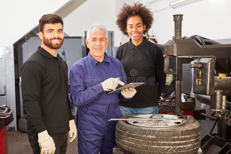 Auto Mechanic and Mechatronics Team Stock Photo - Image of mechatronics ...
