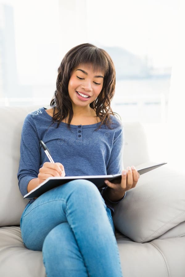 Smiling Casual Woman Writing Notes Stock Photo - Image of pretty ...