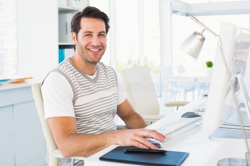 Smiling Casual Young Man Using Computer Stock Image - Image of person ...