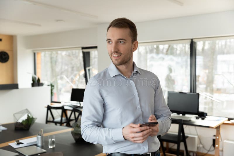Smiling Caucasian Businessman Look In Distance Thinking Stock Image