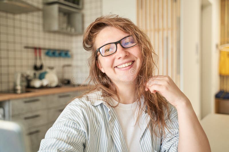 Smiling Caucasian Young Female with Glasses in Cozy Modern Kitchen ...