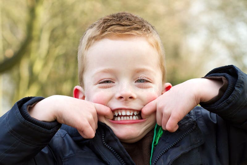 Smiling cheeky boy stock photo. Image of portrait, smile - 23533716