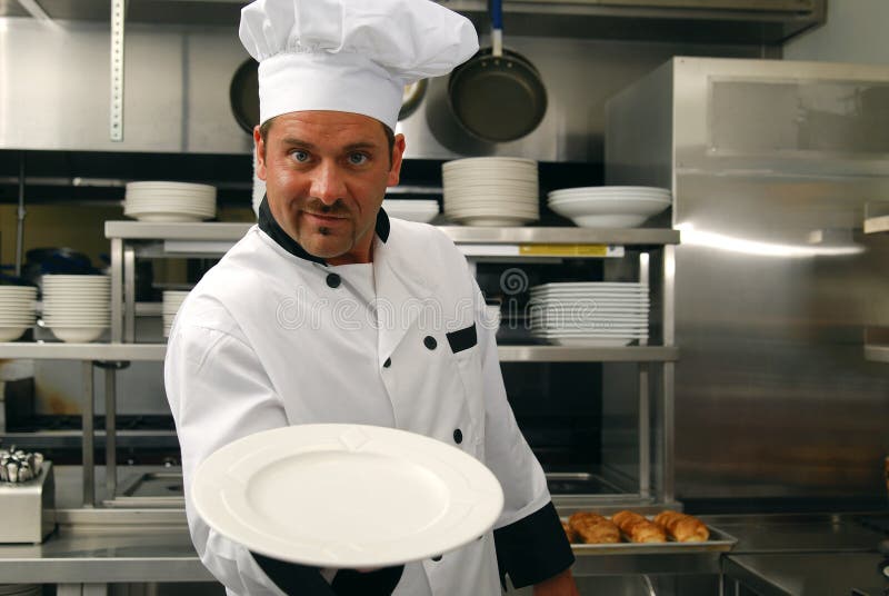 Smiling Chef with Empty Plate Stock Photo - Image of smiling, happy ...