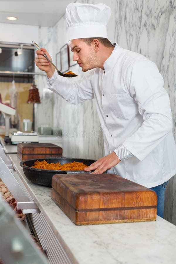 Smiling Chief Cooking Fresh Meat Stock Photo - Image of fresh, piece ...