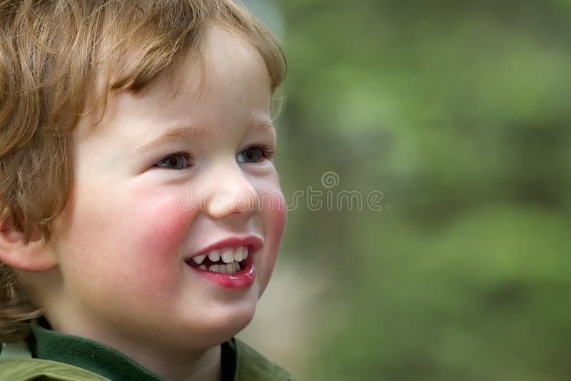 Smiling child stock photo. Image of jolly, cheerful, green - 1173042