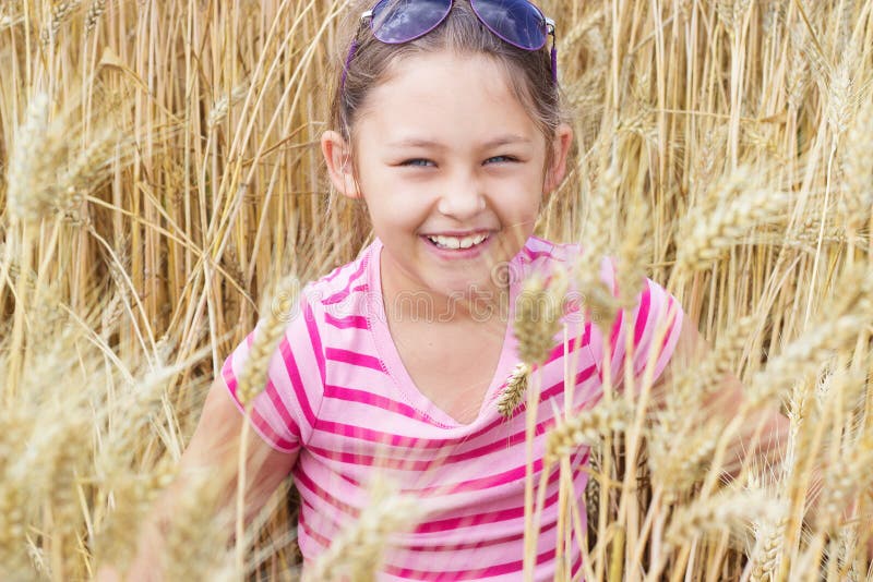 Smiling child stock image. Image of crop, plant, colored - 56698097