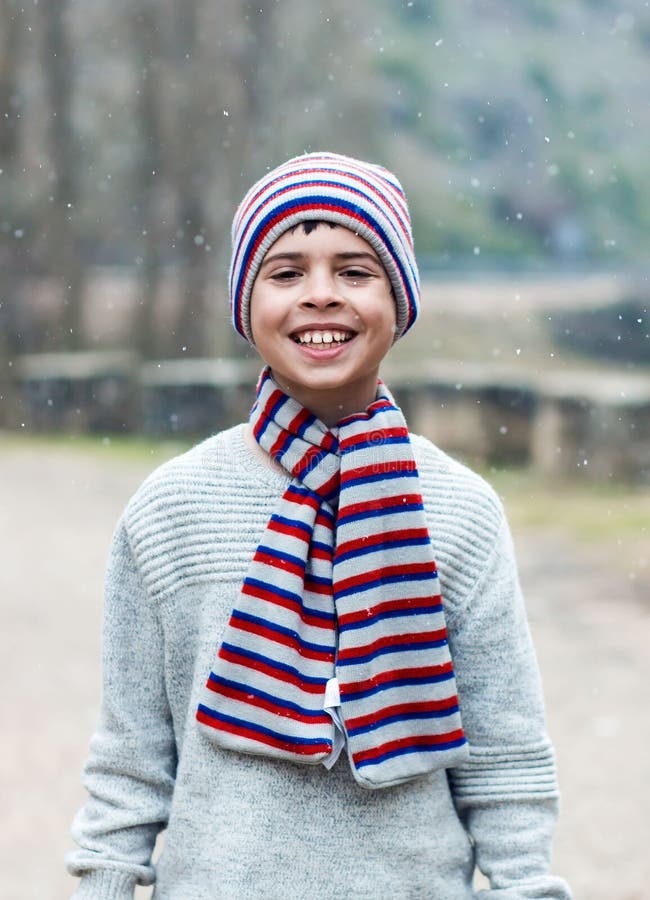 Smiling Child in Cold Snowy Day Stock Image - Image of lifestyle ...