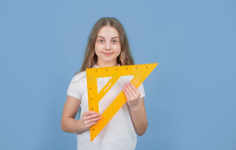 Smiling Child with Math Triangle Measuring Tool Stock Photo - Image of ...