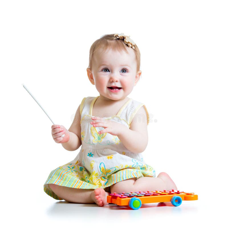 Smiling Child Playing with Musical Toy Stock Photo - Image of colorful ...