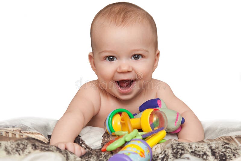 Smiling child with toys stock image. Image of handsome - 65784735