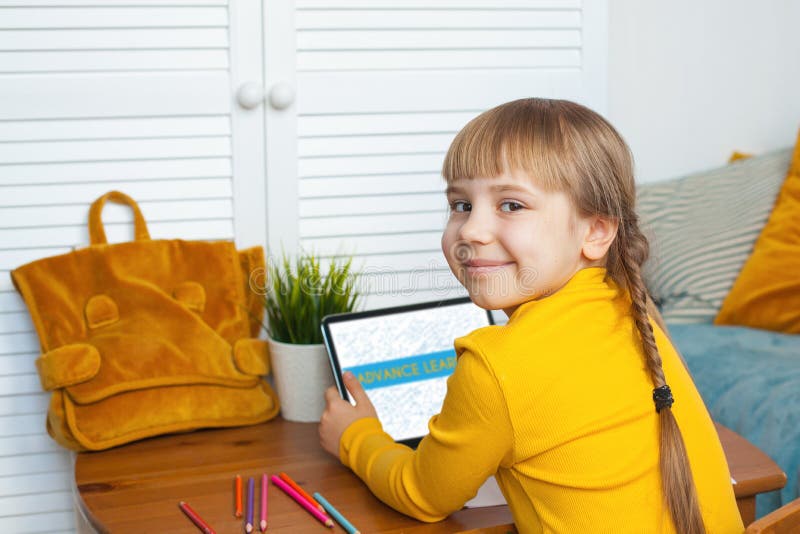 Smiling Child Using Tablet at Home Stock Image - Image of laptop ...