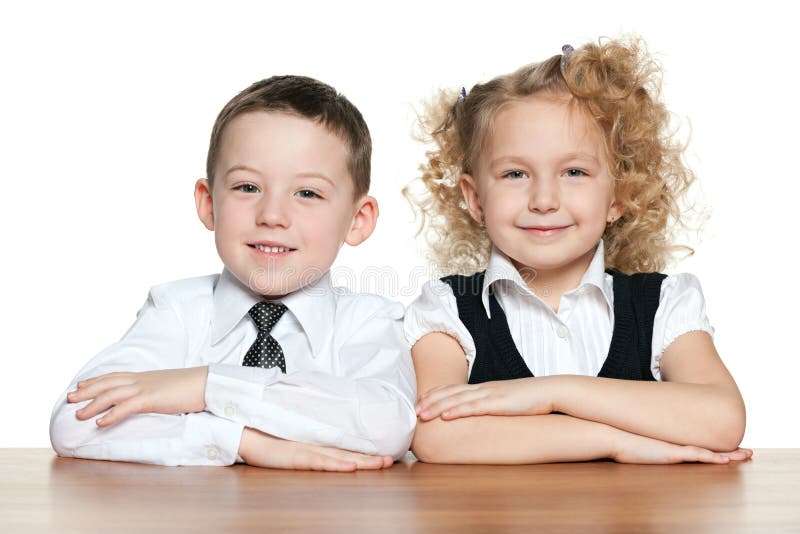 Smiling Children at the Desk Stock Image - Image of little, caucasian ...
