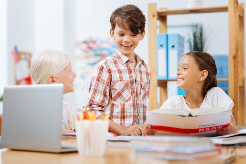 Smiling Children Doing Homework Together in a Room Stock Image - Image ...