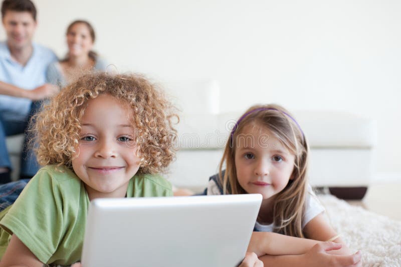 Children Using Digital Tablet with Teacher Stock Image - Image of ...