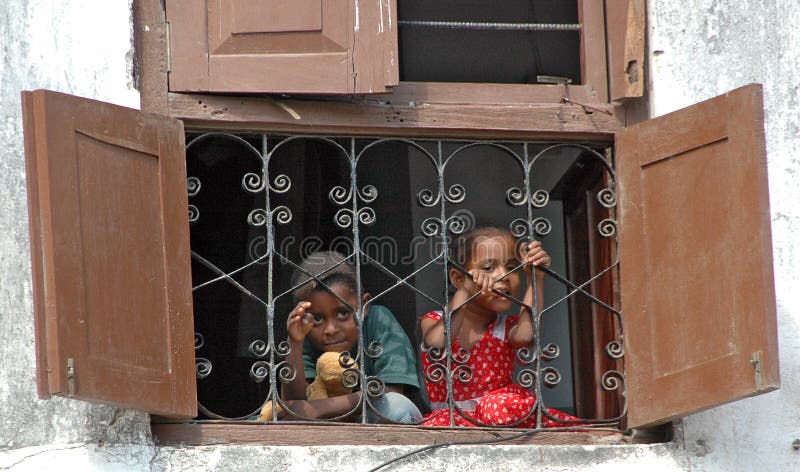 Smiling children in window editorial photography. Image of play - 38419422