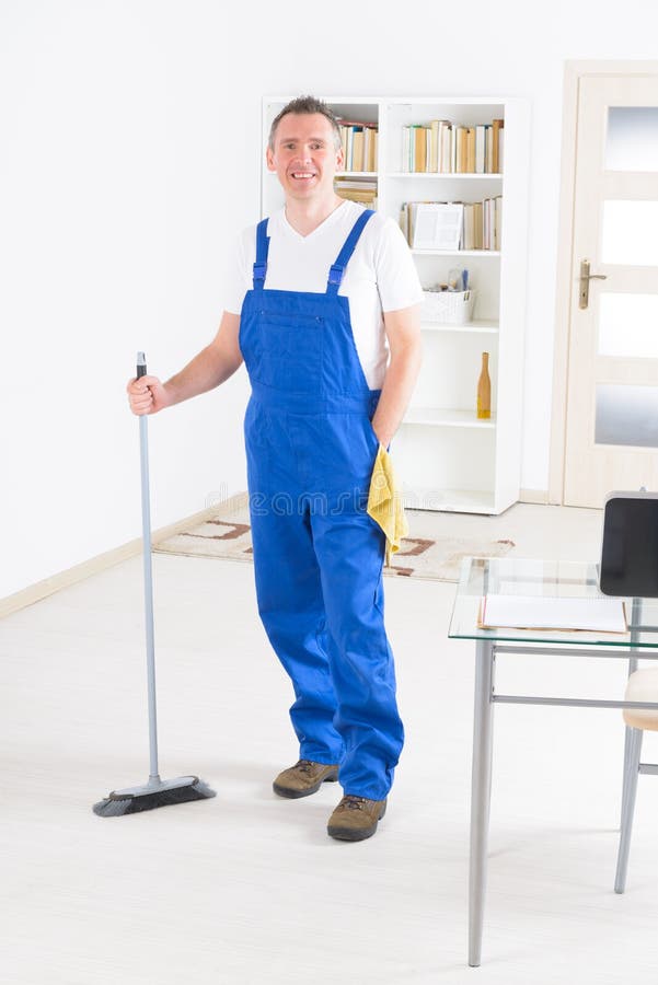 Smiling Cleaner at the Office Stock Photo - Image of broom, equipment ...