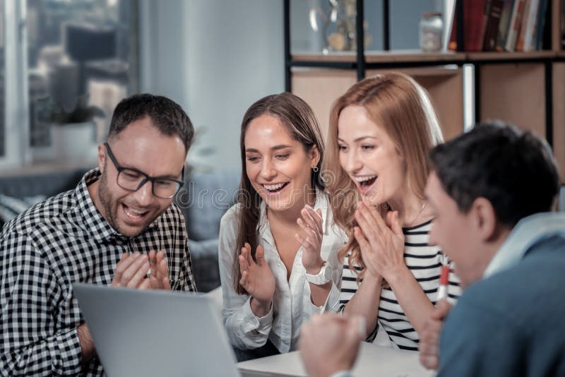 Smiling Co-workers Working on a Project Stock Photo - Image of gadget ...
