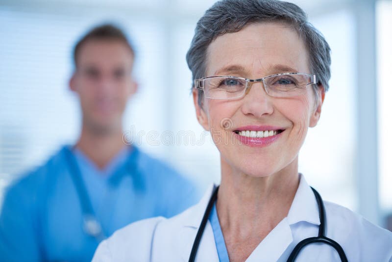 Smiling Colleagues Doctors Looking at the Camera Stock Photo - Image of ...