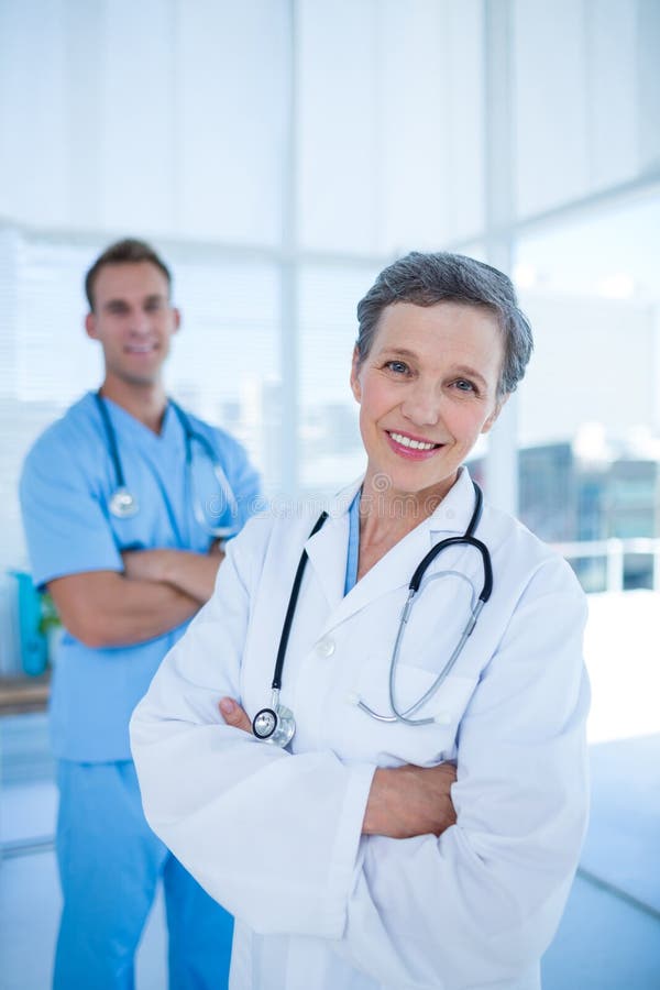 Happy Medical Co Workers Arms Stock Photos - Free & Royalty-Free Stock ...