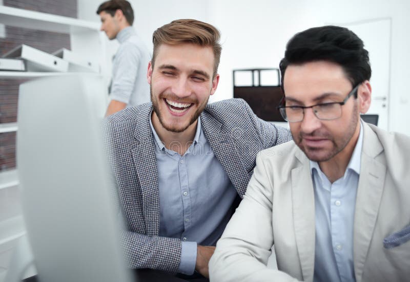 Smiling Colleagues Looking at the Computer Monitor Stock Image - Image ...