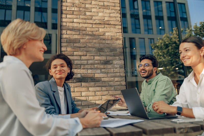 Smiling Colleagues Working Together Developing Business Strategy for ...